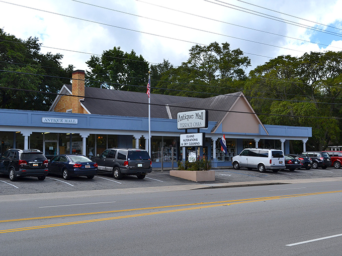 The unassuming exterior of Terrace Oaks Antique Mall hides a wonderland of treasures within, like a time-travel portal disguised as a strip mall storefront. 