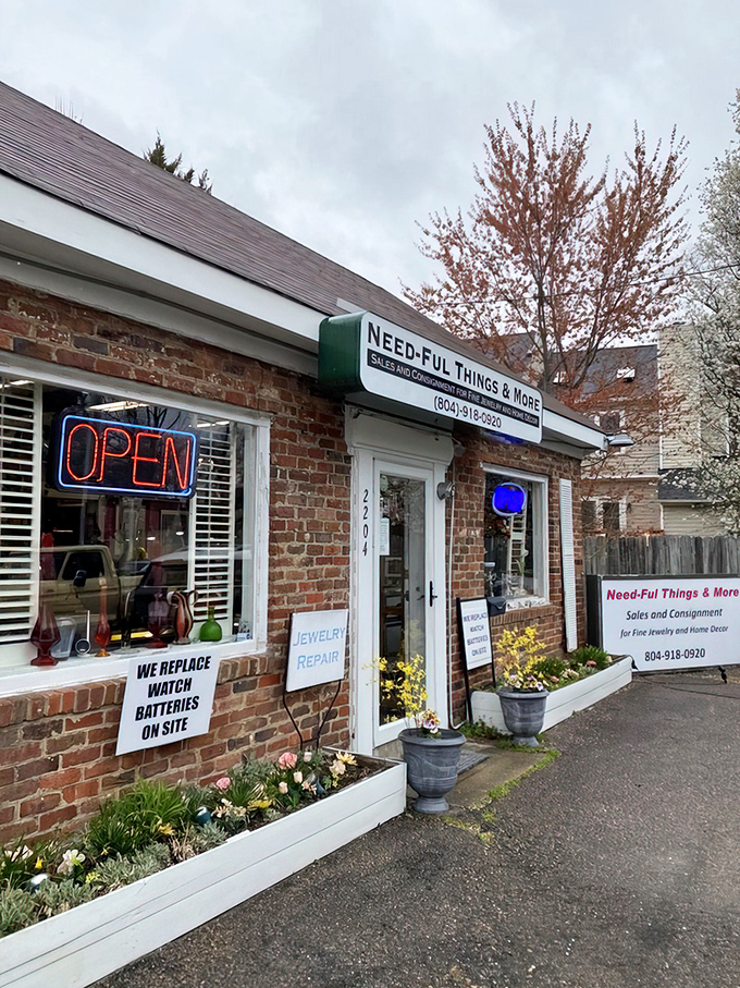 Spring blooms complement the vintage charm of this Henrico gem. The sign promises jewelry repair, but inside awaits an entire universe of forgotten treasures.