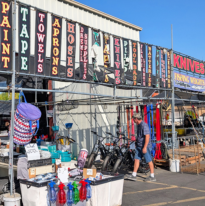Colorful vendor banners announce a treasure hunter's paradise &ndash; knives, tools, and fishing weights beckon like a hardware store designed by Willy Wonka.