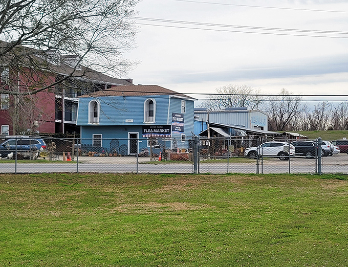 The blue beacon of bargain hunting stands proudly along River Road, promising treasures that won't break the bank but might fill your trunk.