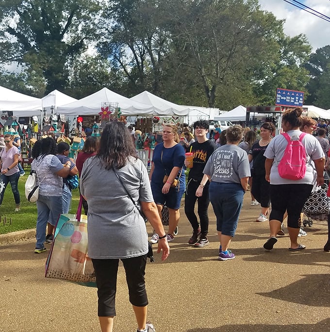 The bustling pathways of Canton Flea Market, where treasure hunting becomes an Olympic sport and shopping bags multiply like rabbits.
