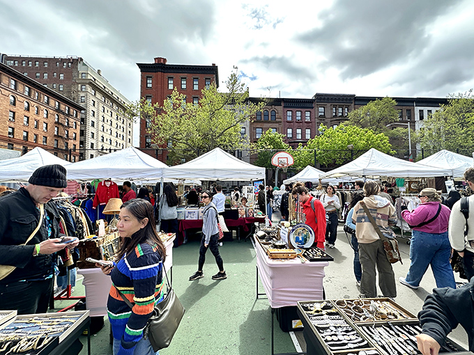 Shoppers weave between tables under the watchful gaze of classic Upper West Side architecture&mdash;New York's version of an open-air museum where everything's for sale.
