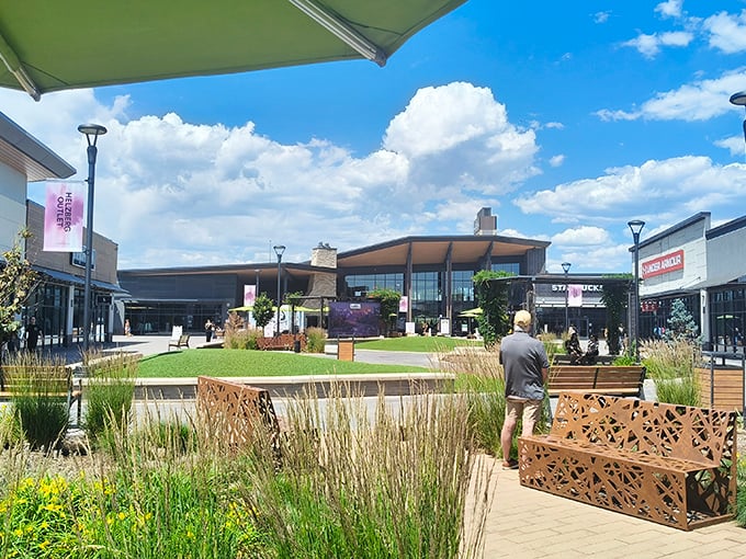 The Colorado sky puts on its own show above Denver Premium Outlets, where shopping meets mountain-state style with thoughtfully designed outdoor spaces.