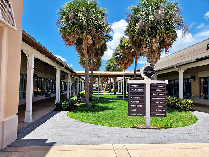Palm trees stand guard over this shopping oasis, where directional signs point to retail treasures like X marks the spot on a bargain hunter's map.