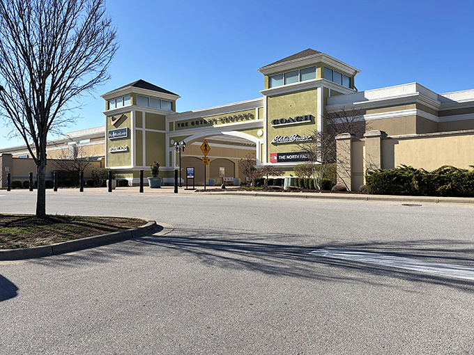 The grand entrance beckons like a retail Emerald City. Coach and North Face logos promise treasures within this Simpsonville shopping paradise.