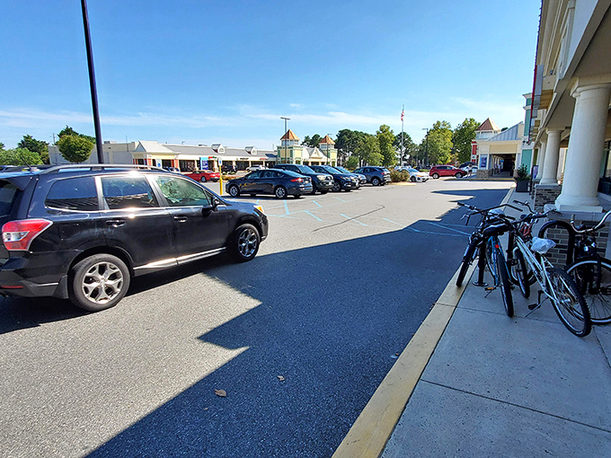 The sprawling parking area at Outlets Ocean City offers a first hint of the bargain hunting paradise that awaits beyond those coastal-inspired facades.