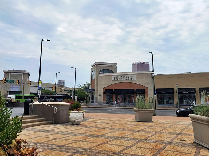 The grand entrance to bargain paradise. Tanger Outlets welcomes shoppers with clean architecture and the promise of wallet-friendly designer finds.
