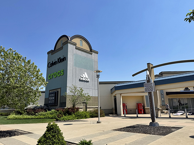 The modern entrance beckons with Calvin Klein and Adidas promising retail therapy at civilized prices.