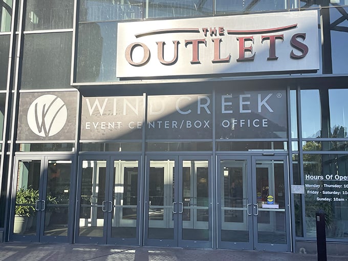 The gleaming entrance to shopping paradise beckons with promises of designer deals and wallet-friendly treasures at The Outlets at Wind Creek Bethlehem.