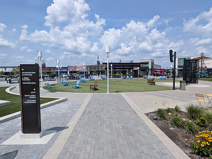 A shopper's oasis under Tennessee blue skies. The central courtyard with colorful Adirondack chairs invites weary bargain hunters to rest their credit cards.
