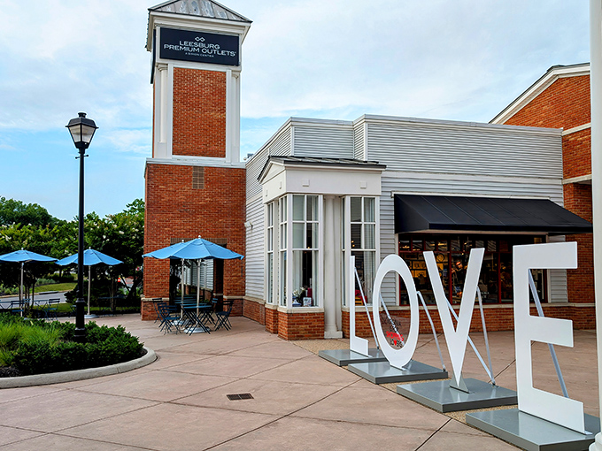 The iconic brick tower and "LOVE" sign welcome shoppers to Virginia's retail paradise. Bargain hunting never looked so architecturally impressive!