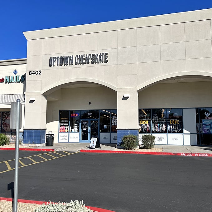 The desert sun bounces off Uptown Cheapskate's clean facade, promising air-conditioned treasure hunting inside. Fashion salvation awaits!