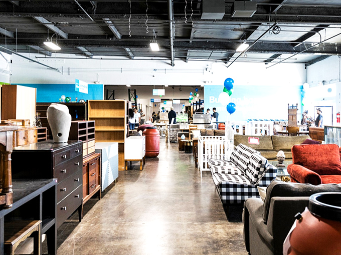Like a well-curated museum of domestic possibility, the ReStore's wide aisles invite exploration where that buffalo-check sofa might just be your next family heirloom.