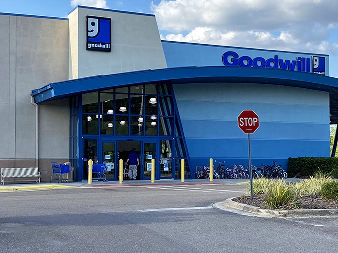 The blue facade of Goodwill's Wesley Chapel location stands like a beacon of bargain possibilities, promising treasure hunts without the sunburn.