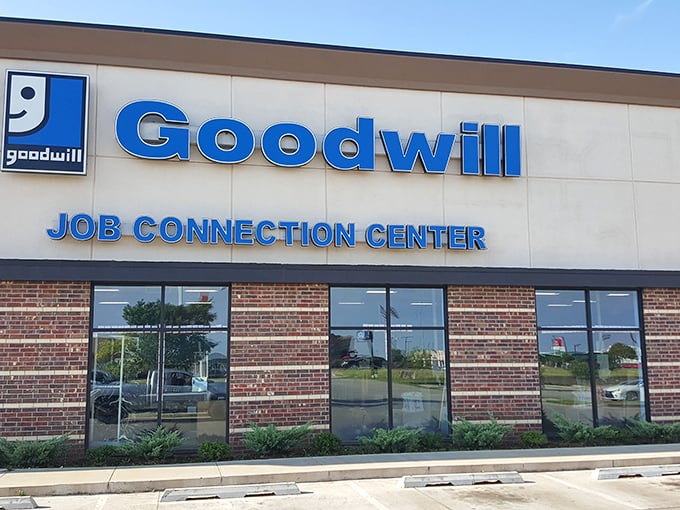 The Norman Goodwill's welcoming facade promises treasure hunting adventures where Job Connection Center meets retail therapy.