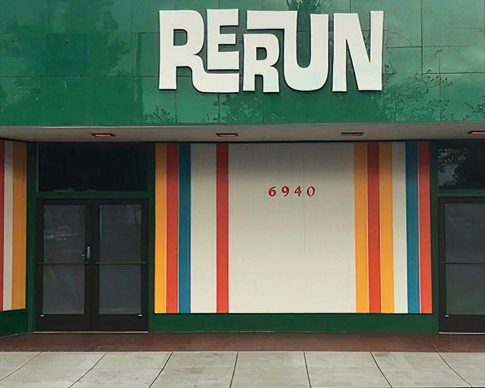 RERUN's vibrant exterior is like a mid-century modern time portal. Those rainbow stripes aren't just decoration&mdash;they're a promise of the colorful treasures waiting inside.