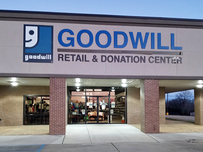 The blue Goodwill sign beckons like a lighthouse for bargain hunters. This unassuming storefront houses treasures waiting to be discovered by savvy Alabama shoppers.