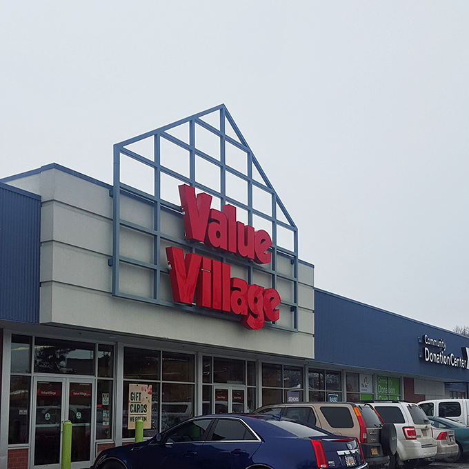The iconic blue and red facade of Value Village stands like a beacon of bargain possibilities under Alaska's often-gray skies.