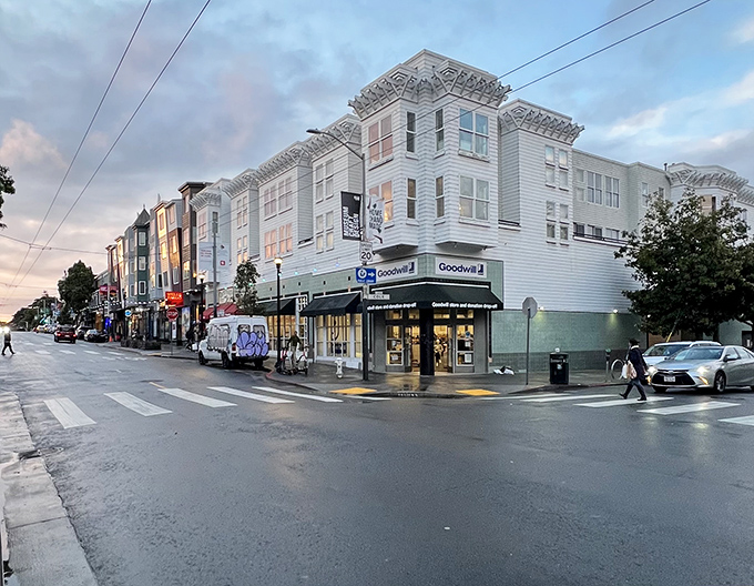 The iconic corner of Haight and Cole Streets, where Victorian architecture meets thrift store treasure hunting in San Francisco's most colorful neighborhood.