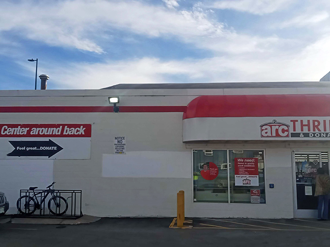 The unassuming entrance to arc Thrift Store &ndash; where fashion dreams and budget realities live in perfect harmony.