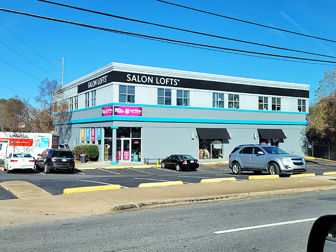 The blue and pink exterior of Out of the Closet stands out like a fashionable beacon on Piedmont Avenue, promising treasures within its walls.