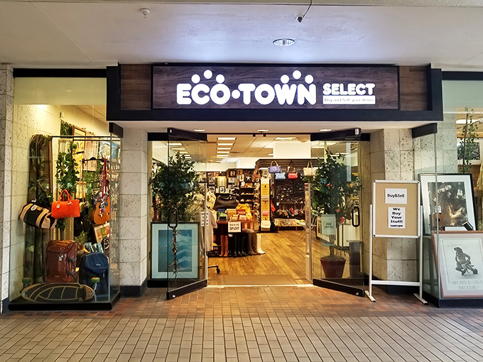 The storefront beckons like a portal to treasure-hunting paradise. Clean lines and modern signage hide the wonderland of secondhand gems waiting inside.