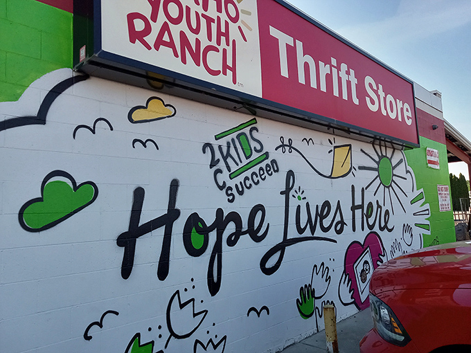 The colorful "Hope Lives Here" mural welcomes treasure hunters to Idaho Youth Ranch. Every brushstroke tells a story of community impact beyond just bargain hunting.