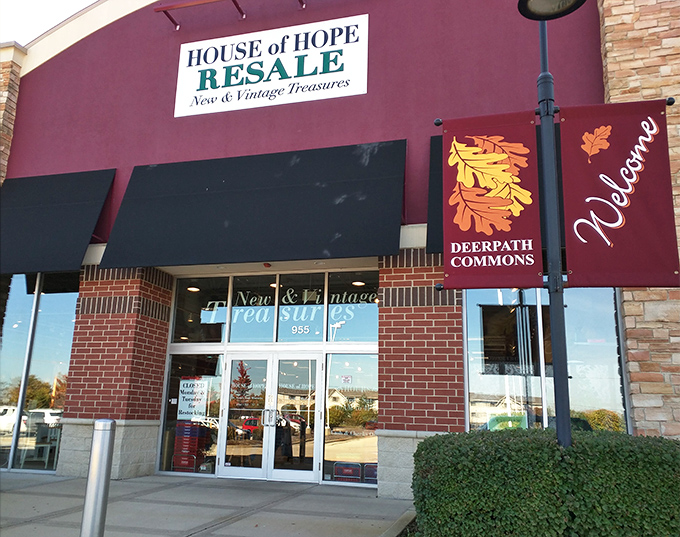 The burgundy and stone facade of House of Hope Resale beckons like a retail oasis in Lake Zurich, promising treasures that won't empty your wallet.