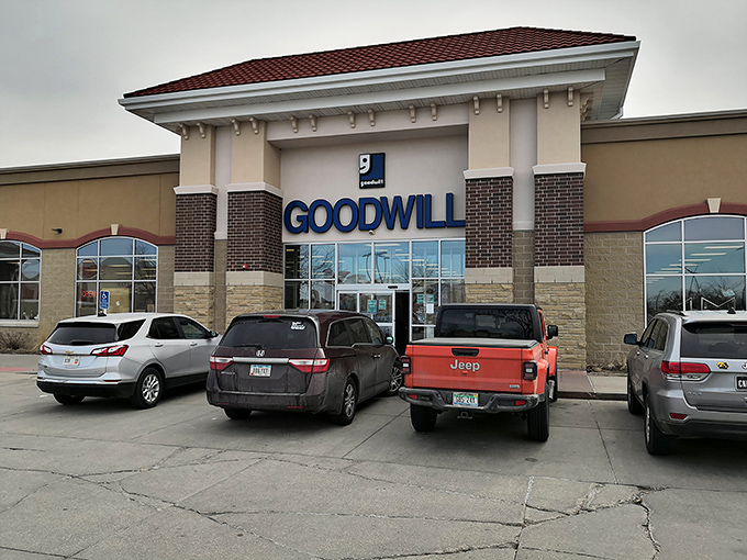 Another angle of thrift paradise &ndash; where SUVs and pickup trucks gather like prospectors at a gold rush, their owners inside mining for bargains.