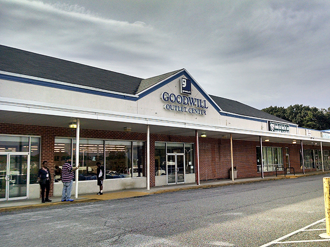 The unassuming exterior of bargain paradise. Like a speakeasy for thrift shoppers, this Goodwill Outlet's plain fa&ccedil;ade hides treasure within.