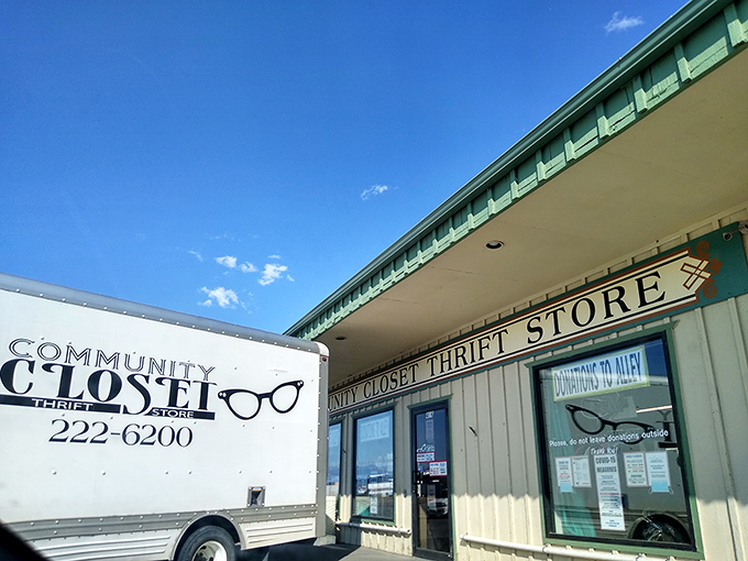 Where thrift meets purpose! Community Closet's delivery truck stands ready to bring new treasures to eager shoppers, a white chariot of second-hand possibilities.