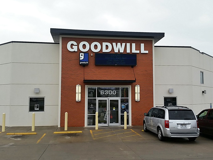 The brick-fronted Goodwill on Apples Way stands like a beacon of bargain hope, promising treasures behind those unassuming glass doors.