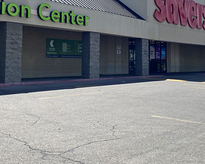 The iconic red Savers sign beckons like a lighthouse for bargain hunters navigating the sea of retail options in Albuquerque.
