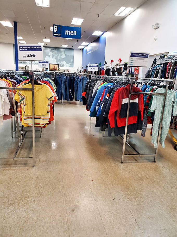 The unassuming exterior hides a treasure trove within. Like a poker player with a royal flush, this Goodwill keeps its best cards hidden from street view.