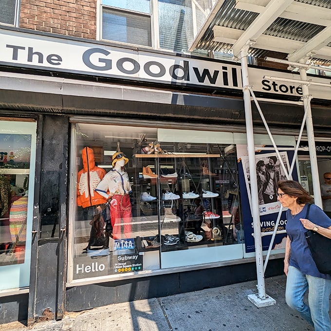 A closer look at the window display showcasing mannequins dressed better than most of us on Monday mornings. Fashion redemption awaits inside!