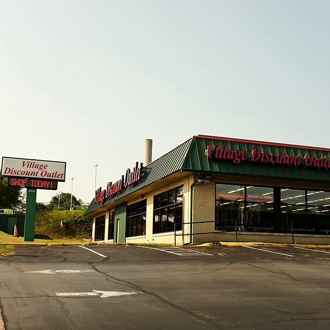 The iconic green roof and "SHOP TODAY!" sign beckon bargain hunters to Village Discount Outlet's treasure-filled wonderland in Cuyahoga Falls.