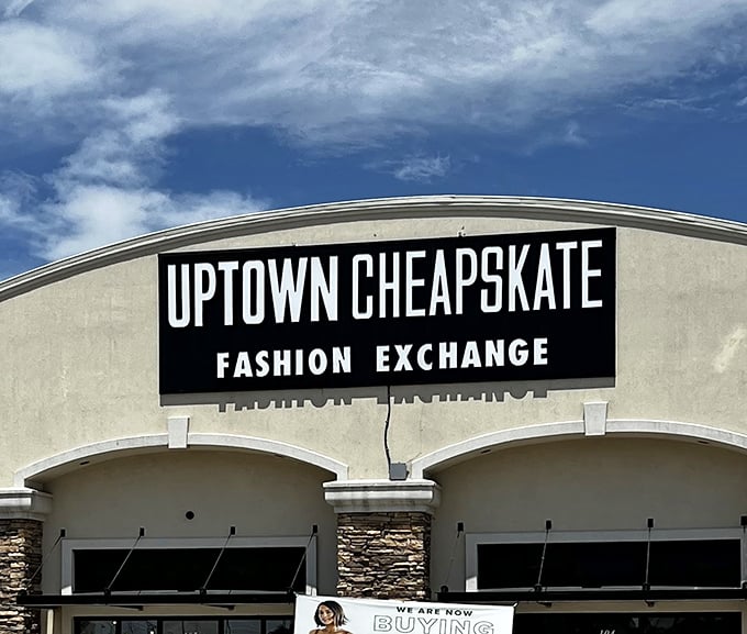 The modern facade of Uptown Cheapskate stands proudly against Oklahoma's blue sky, promising fashion treasures without the treasure-map prices.