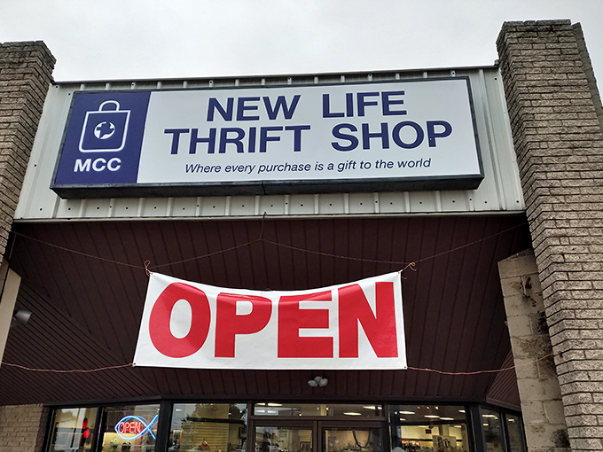 The blue and white sign promises more than bargains&mdash;it's a gateway to guilt-free retail therapy where every purchase helps someone else.