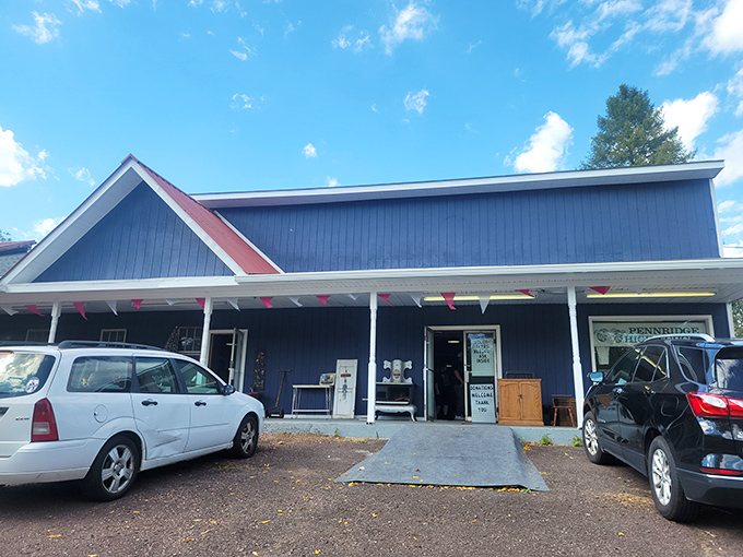 Blue exterior with classic small-town charm. Cars parked outside suggest others have already discovered this hidden Pennsylvania gem.