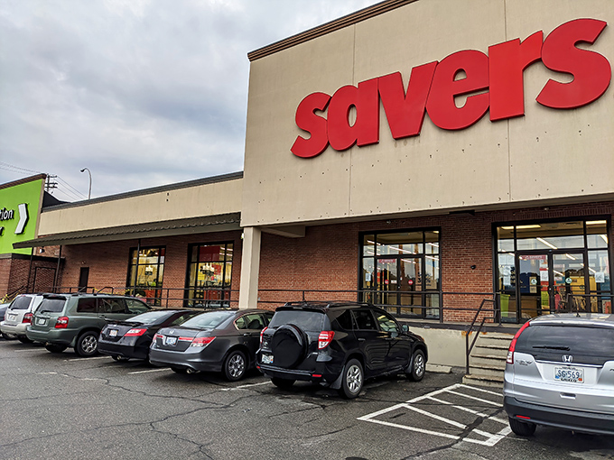 The iconic red Savers sign beckons like a lighthouse to bargain hunters navigating the sea of retail sameness.