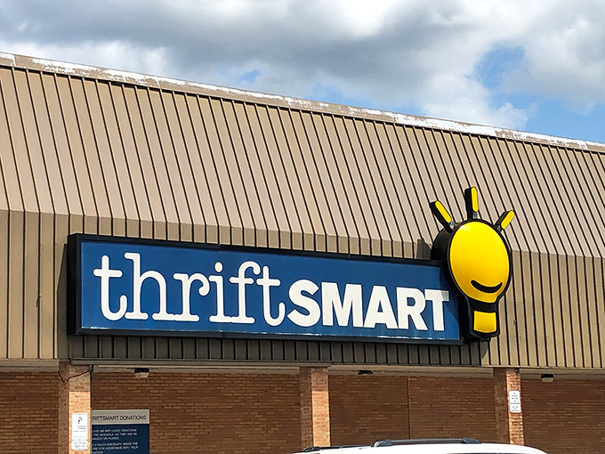 The cheerful yellow lightbulb logo welcomes bargain hunters like a beacon of thrifty hope against Nashville's sky.