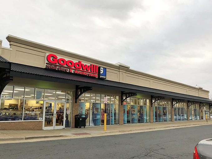 The iconic red Goodwill sign beckons bargain hunters like a lighthouse guiding ships to safe harbor&mdash;except here, the treasures aren't sunken!