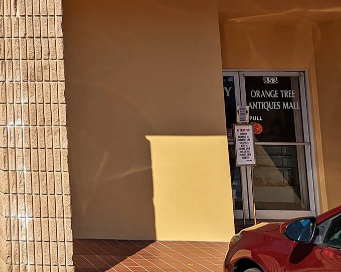 The unassuming entrance to Orange Tree Antiques Mall &ndash; like finding the door to Narnia between a nail salon and a sandwich shop.