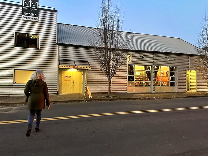 AKADI's unassuming exterior hides culinary treasures within, like finding a secret passage to flavor town behind that cheerful yellow door.