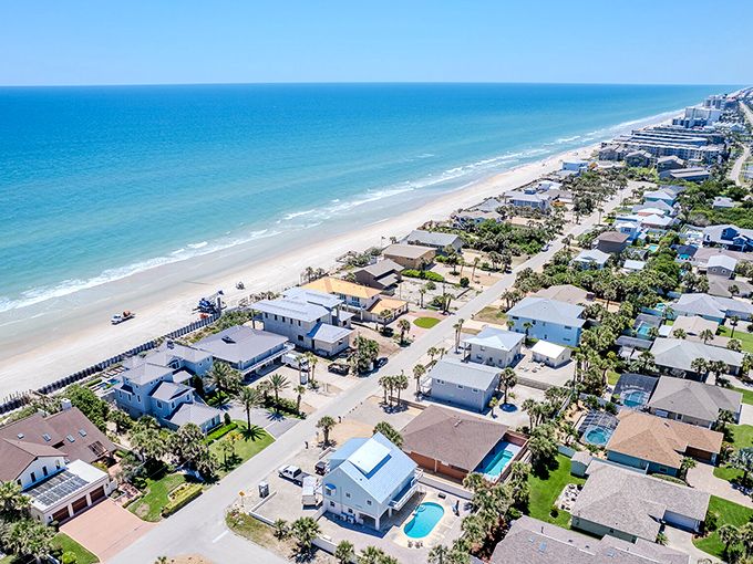 Golden hour transforms New Smyrna Beach into a watercolor painting, with streets leading directly to sunset-kissed waves.