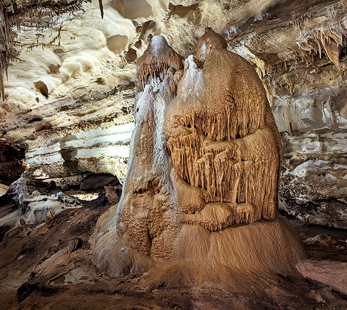 This massive formation resembles a melting wedding cake designed by Mother Nature herself, layer upon layer of mineral deposits creating this stunning masterpiece.