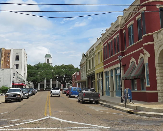 Downtown Abbeville's historic buildings frame the iconic church steeple, creating that perfect small-town tableau that makes you want to slow down and stay awhile.