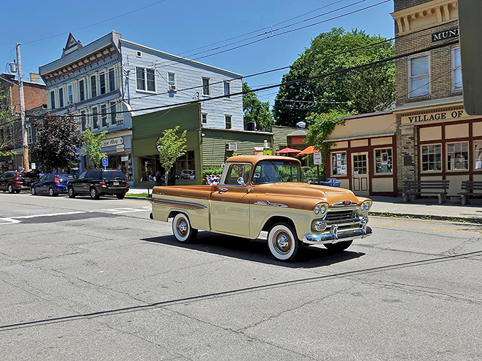 Main Street charm on full display with a vintage pickup truck that's clearly living its best life. Norman Rockwell would've added this to his portfolio.