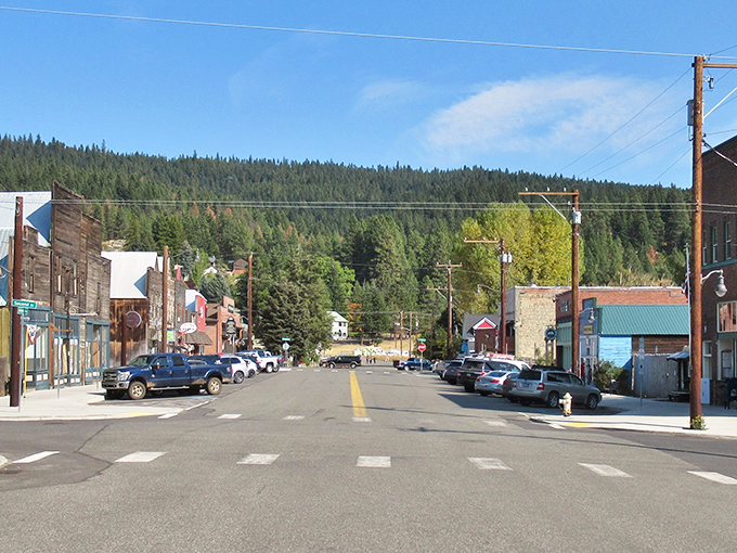 Main Street Roslyn stretches toward pine-covered hills, where historic storefronts stand like sentinels guarding a simpler time.