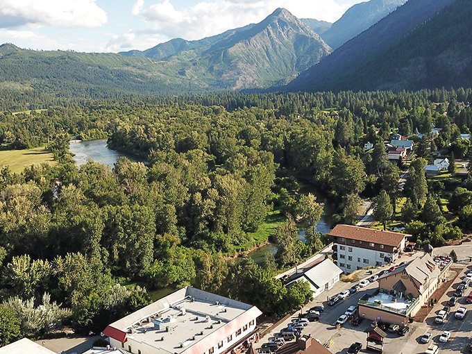 Ah, the kind of view that makes you forget your inbox exists &mdash; mountains, river, and small-town calm.